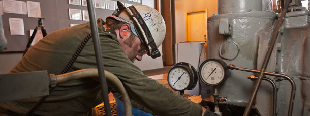 Doyon Utilities employee working | Doyon Utilities